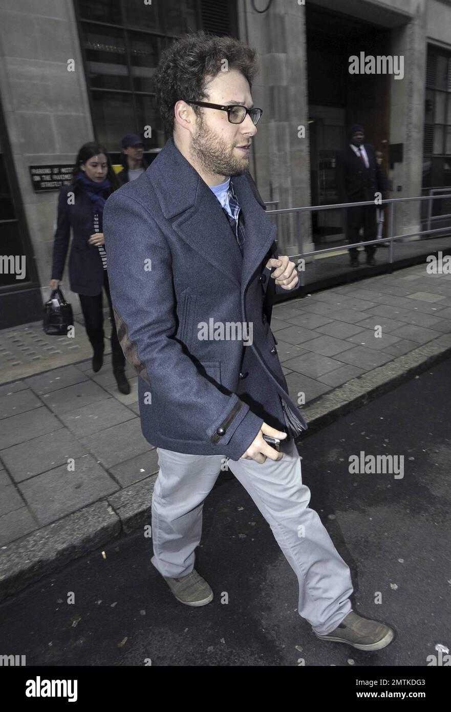 Seth Rogen makes some funny faces as he leaves BBC Radio 1 after an ...