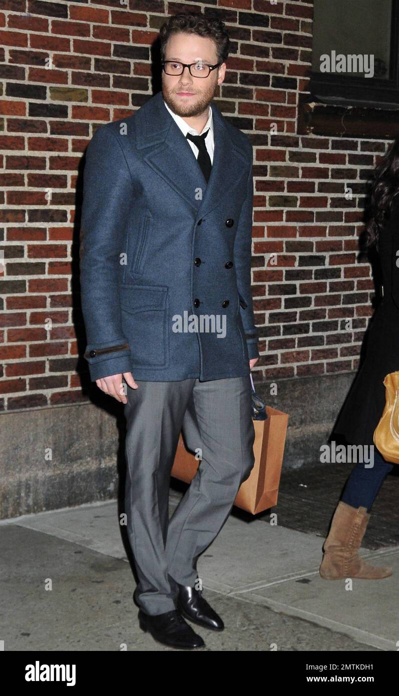 Seth Rogen looks slim and trim as he poses for photos outside the "Late ...