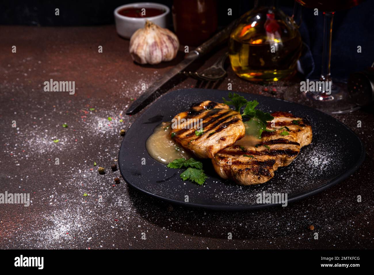 American bbq food concept. Grilled barbeque pork meat steaks with ...