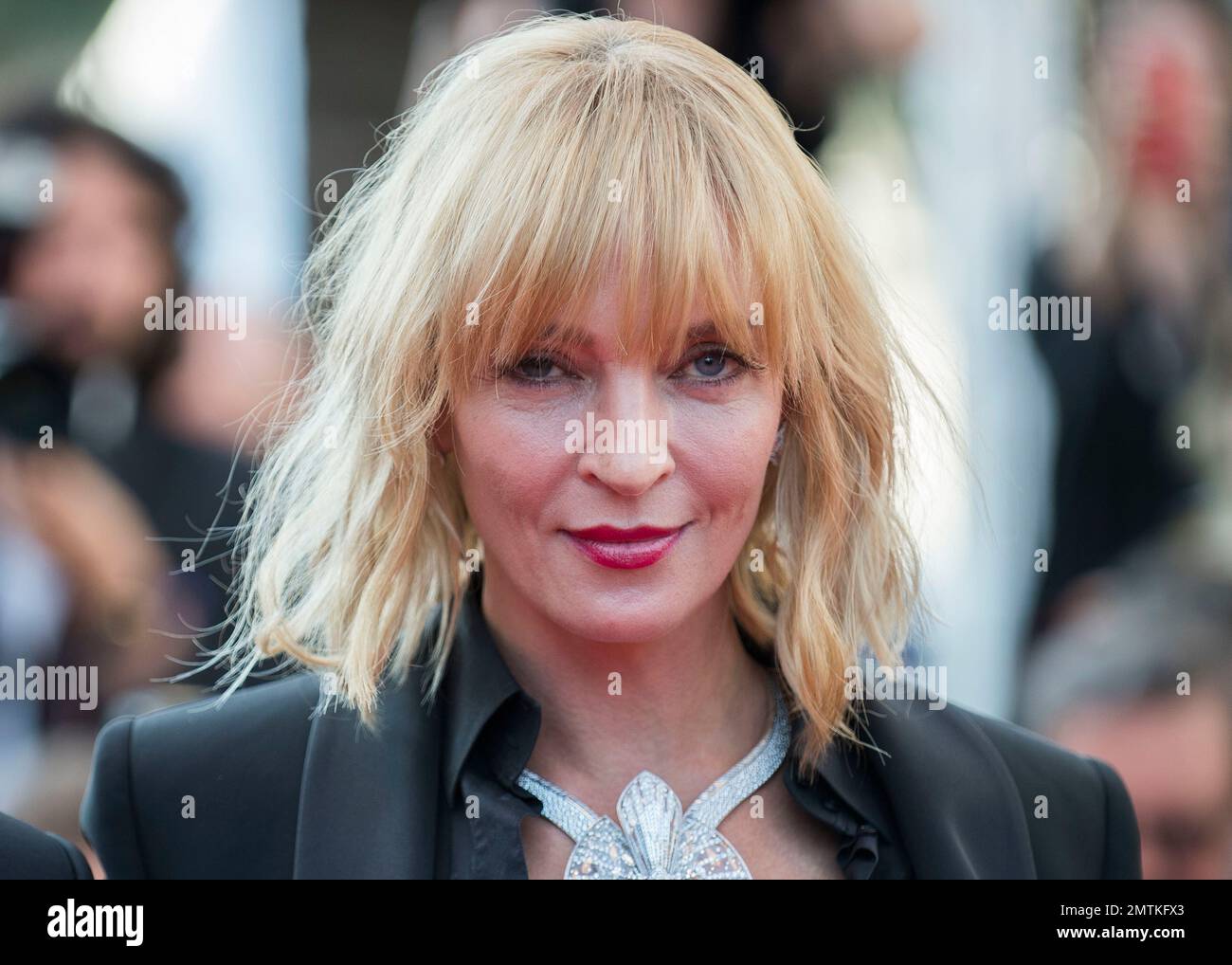 Uma Thurman poses for photographers upon arrival at the screening of ...