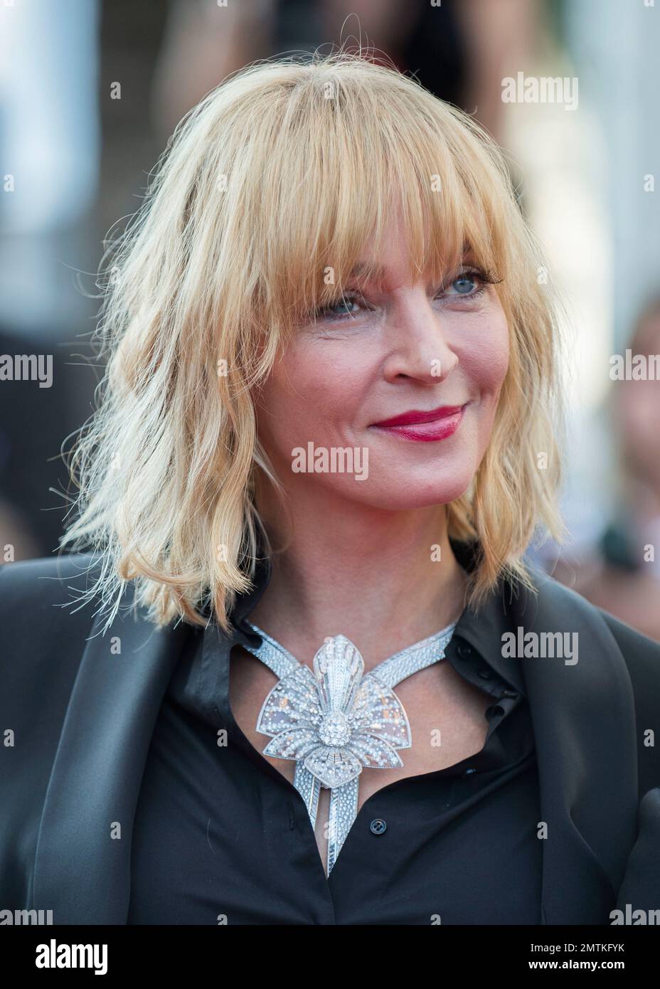 Uma Thurman poses for photographers upon arrival at the screening of ...