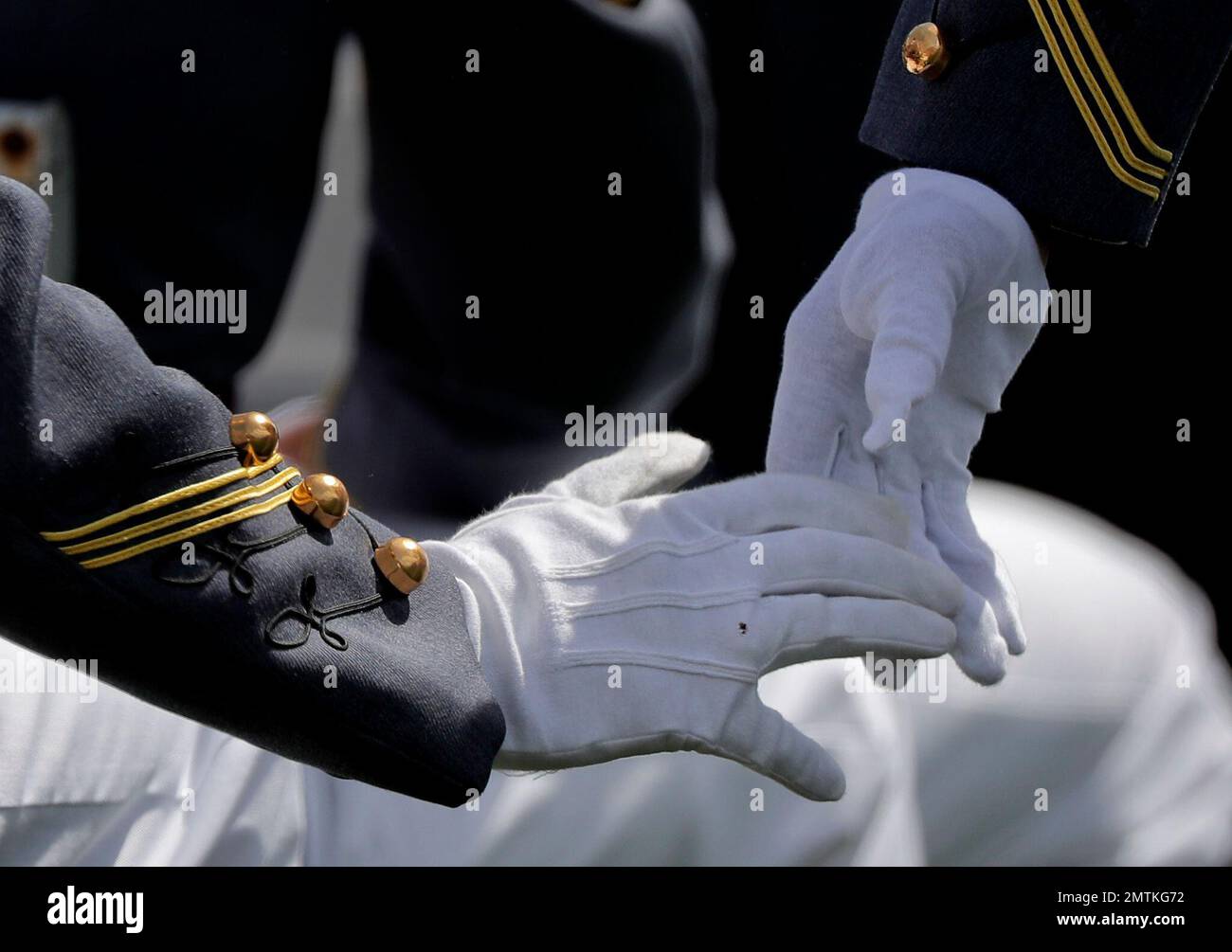 United States Military Academy cadets shake hands after receiving their ...