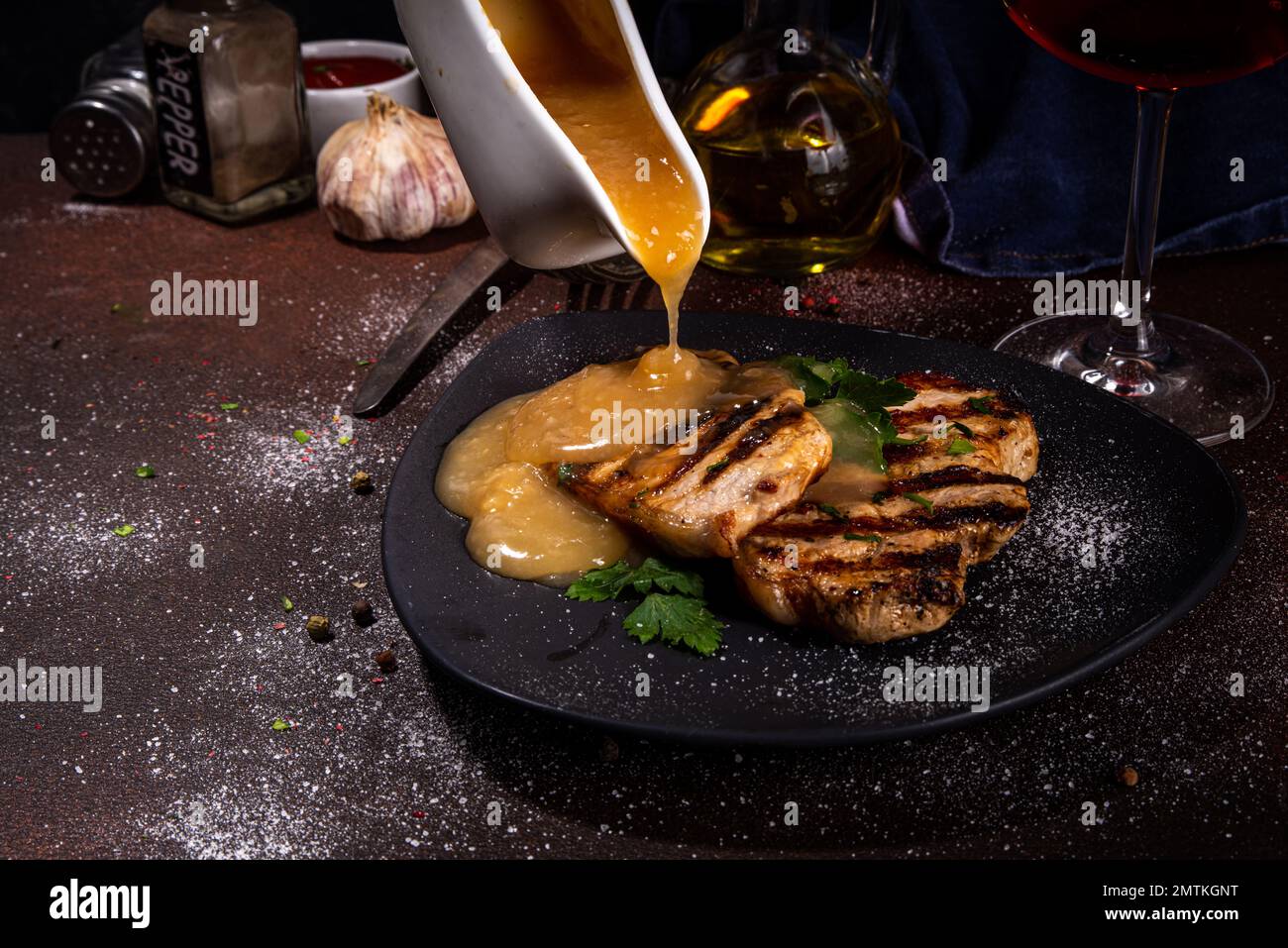 American bbq food concept. Grilled barbeque pork meat steaks with ...