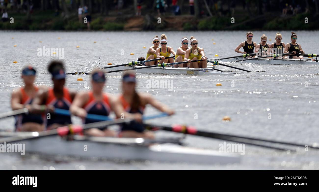 The Washington women's varsity four team, right, is chased by Michigan ...