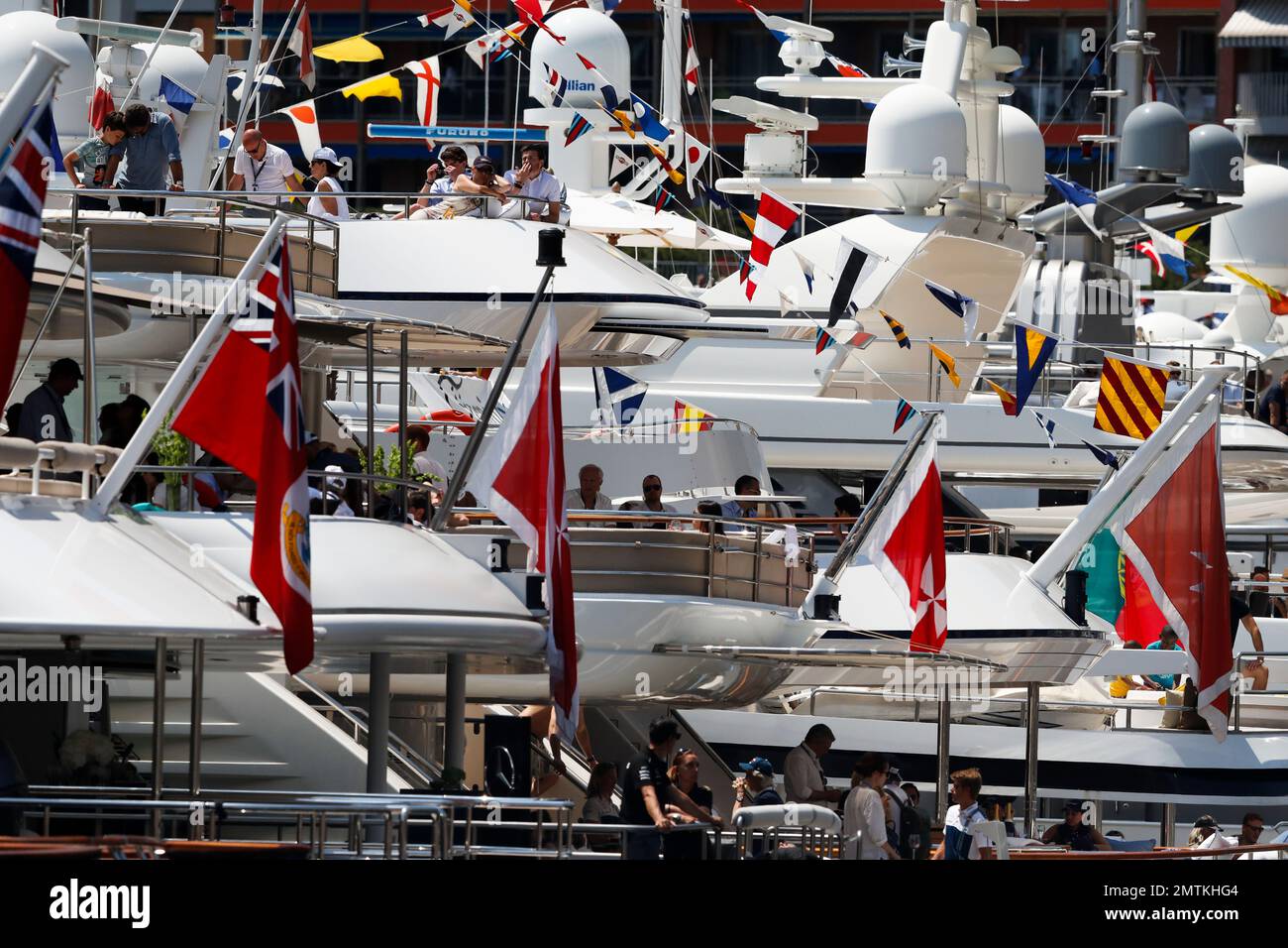 Yachts anchor in the Monaco harbor close to the racetrack of the ...
