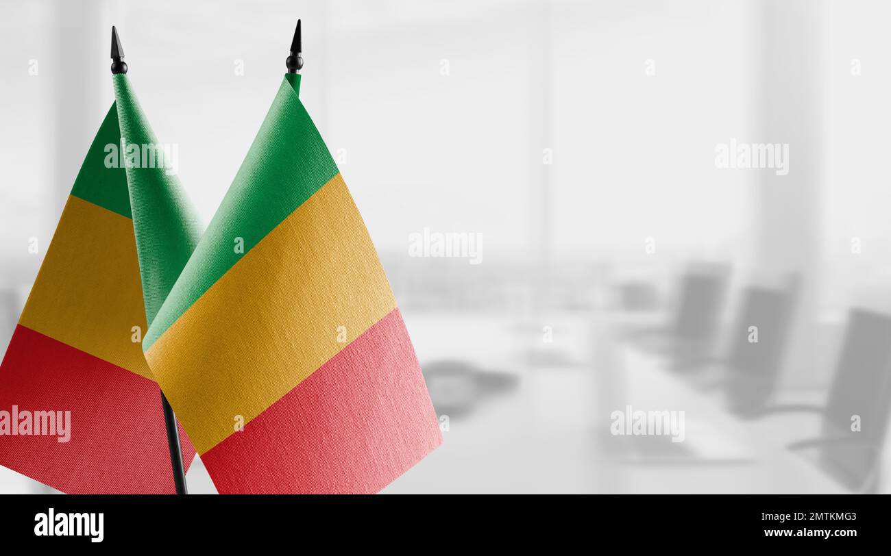 Small flags of the Mali on an abstract blurry background Stock Photo ...