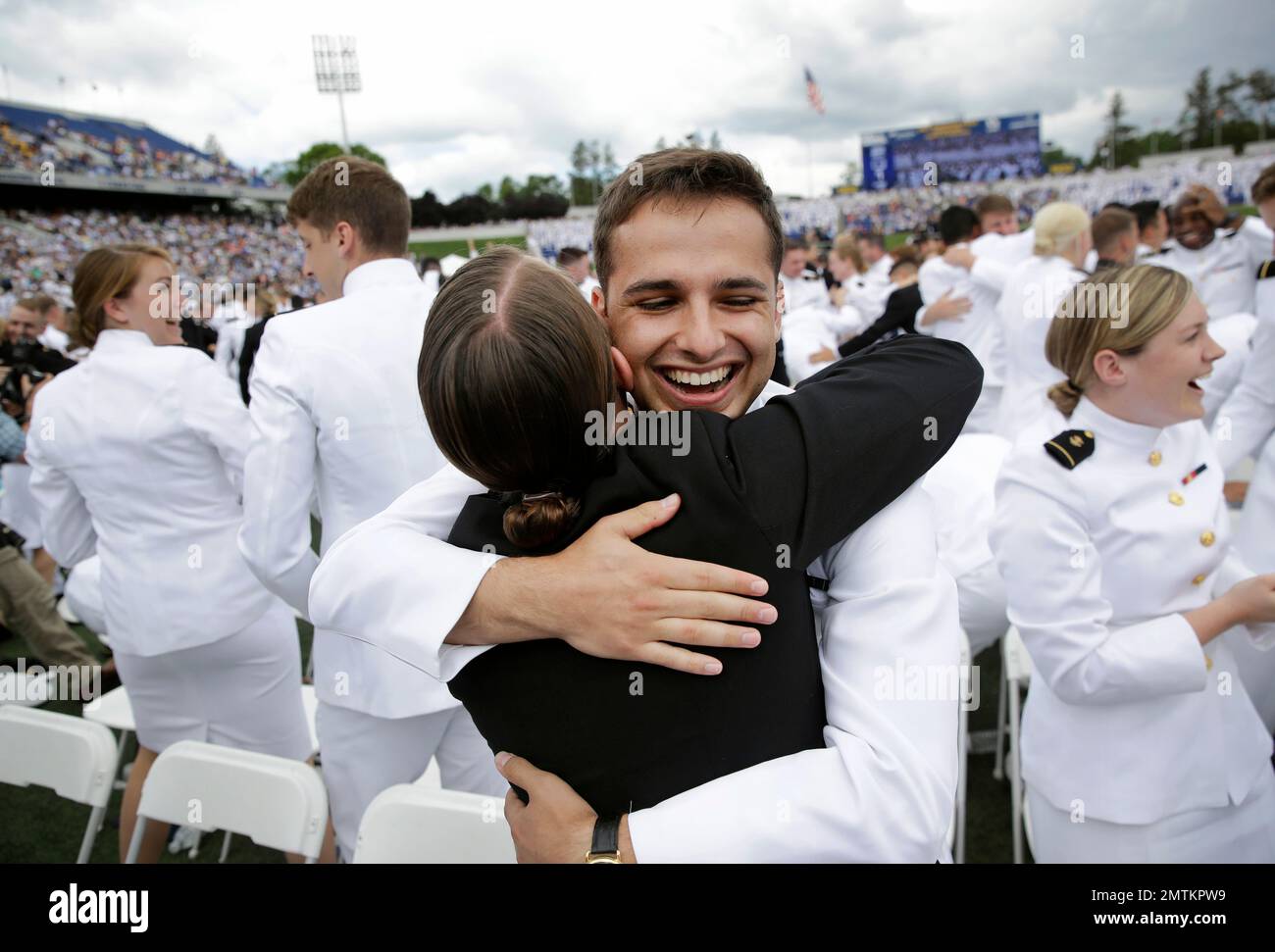 U.S. Naval Academy graduates celebrate after the Academy's graduation ...