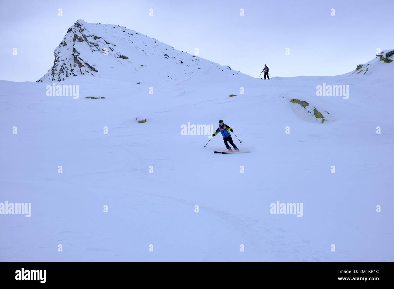 Two men backcountry skiing in hi-res stock photography and images - Alamy