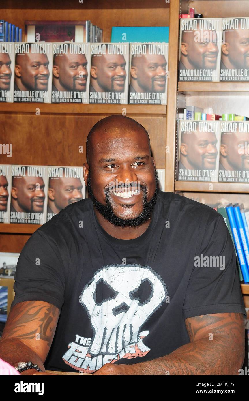 Shaquille O'Neal signs copies of his new book "Shaq Uncut" at Books and ...