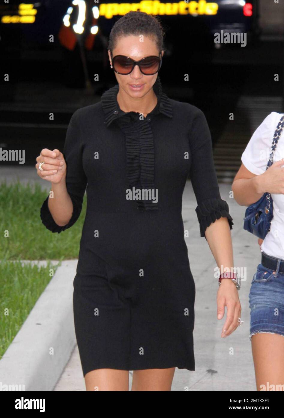 EXCLUSIVE!! Boris Becker and his pregnant wife Sharlely are greeted by ...