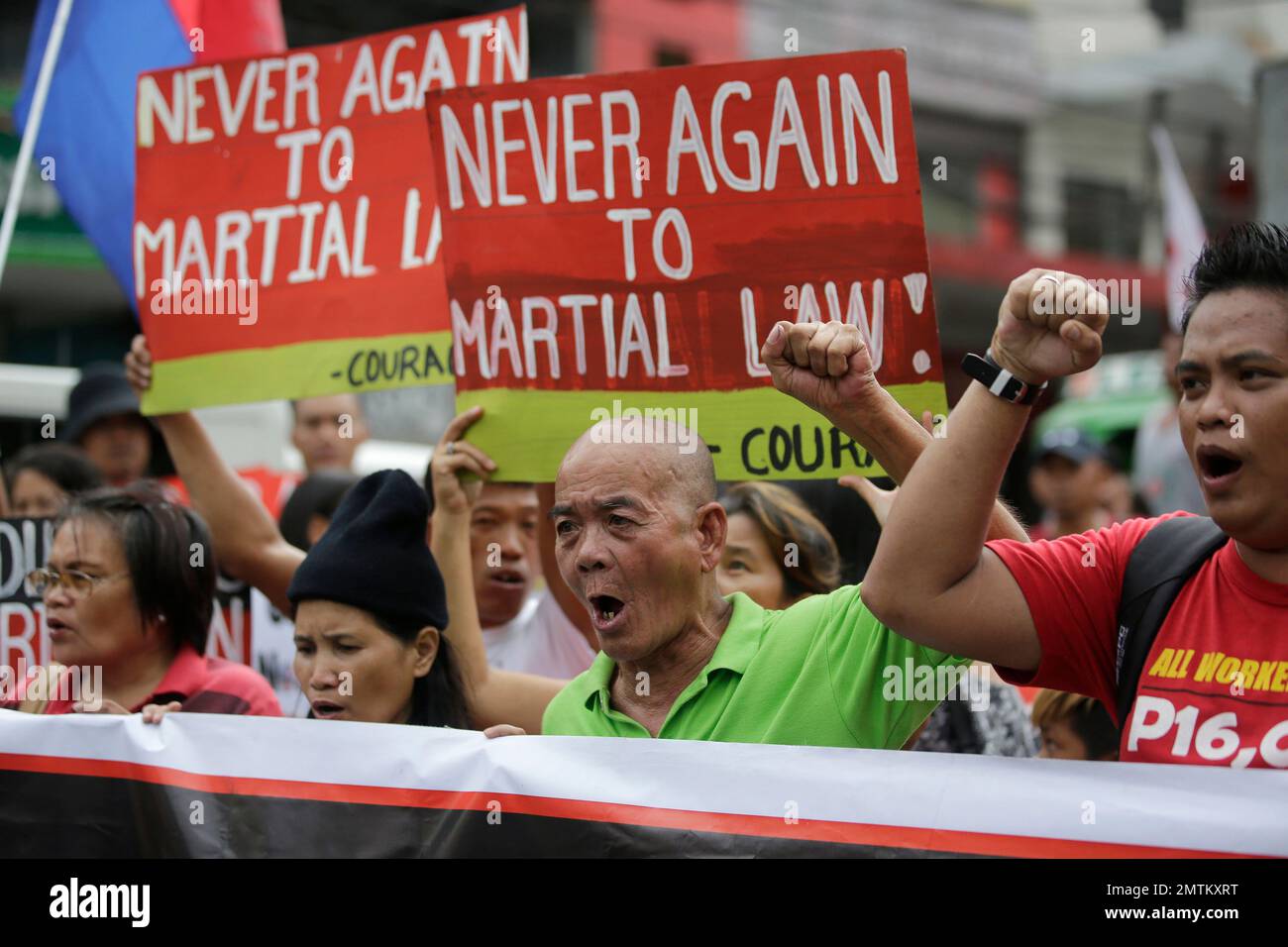 Filipino activists shout slogans as they oppose the recent declaration ...