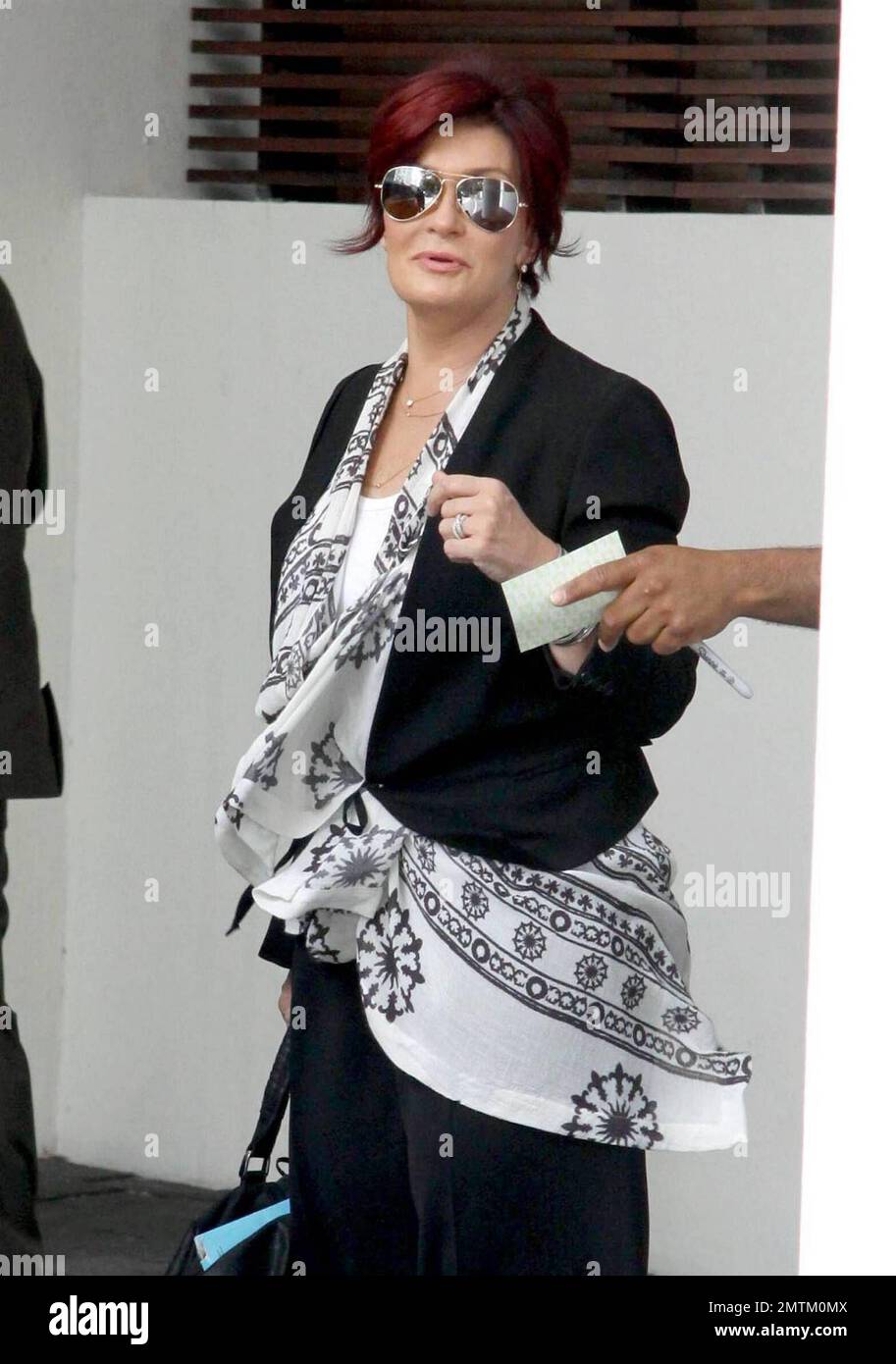 Exclusive!! Sharon Osbourne leaves her luxury hotel to head off to work ...
