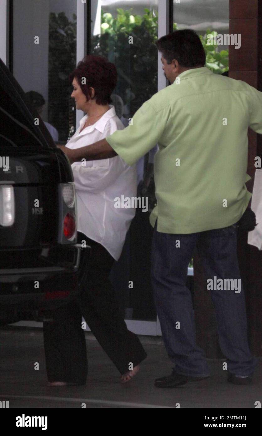Exclusive!! Sharon Osbourne leaves for work with a glass of ice water ...