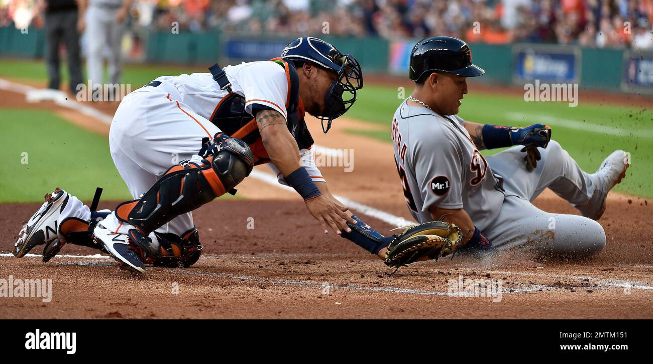 Detroit Tigers' Miguel Cabrera, right, is tagged out at home by Houston ...