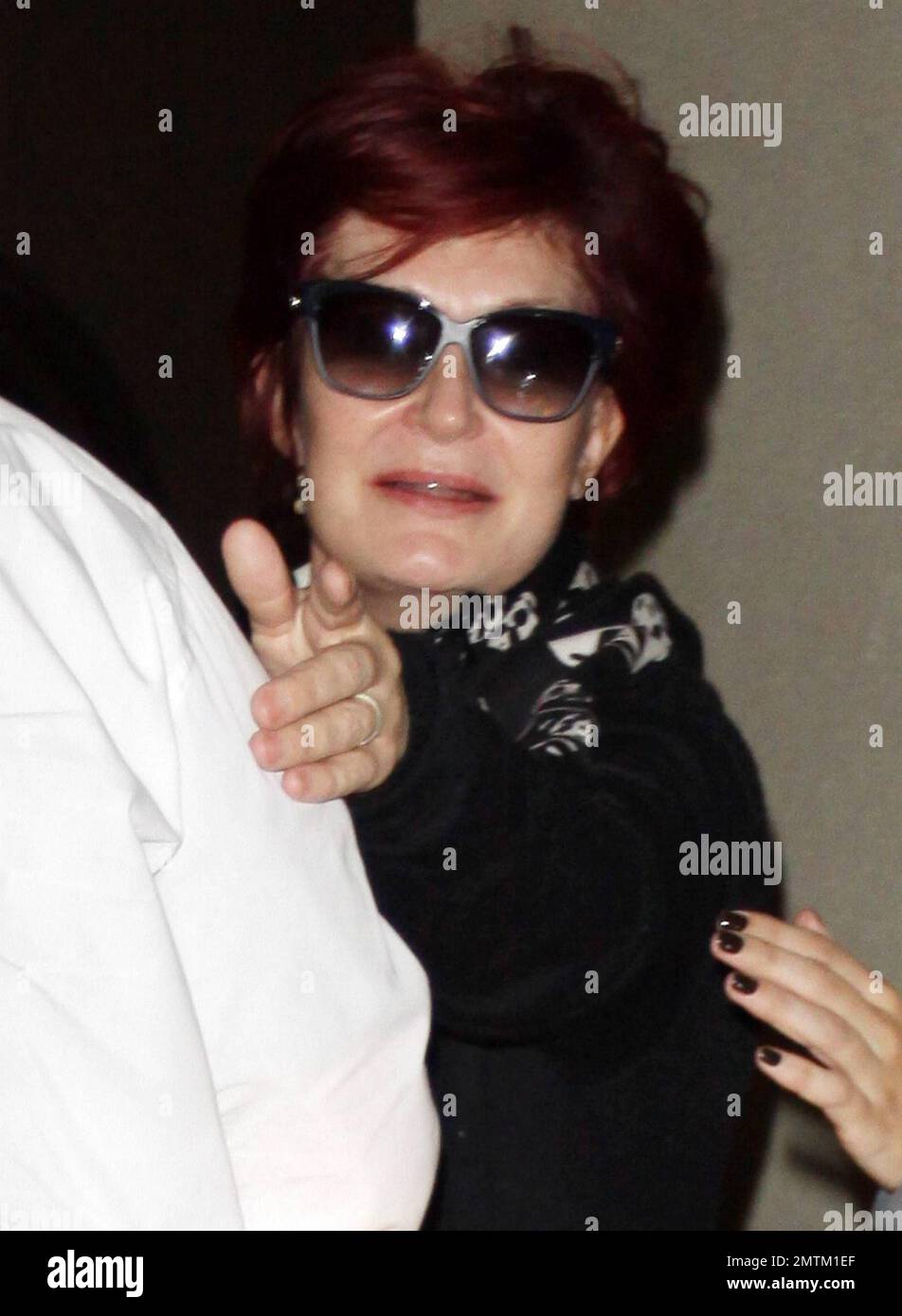 EXCLUSIVE!! TV personality Sharon Osbourne points something out to a ...