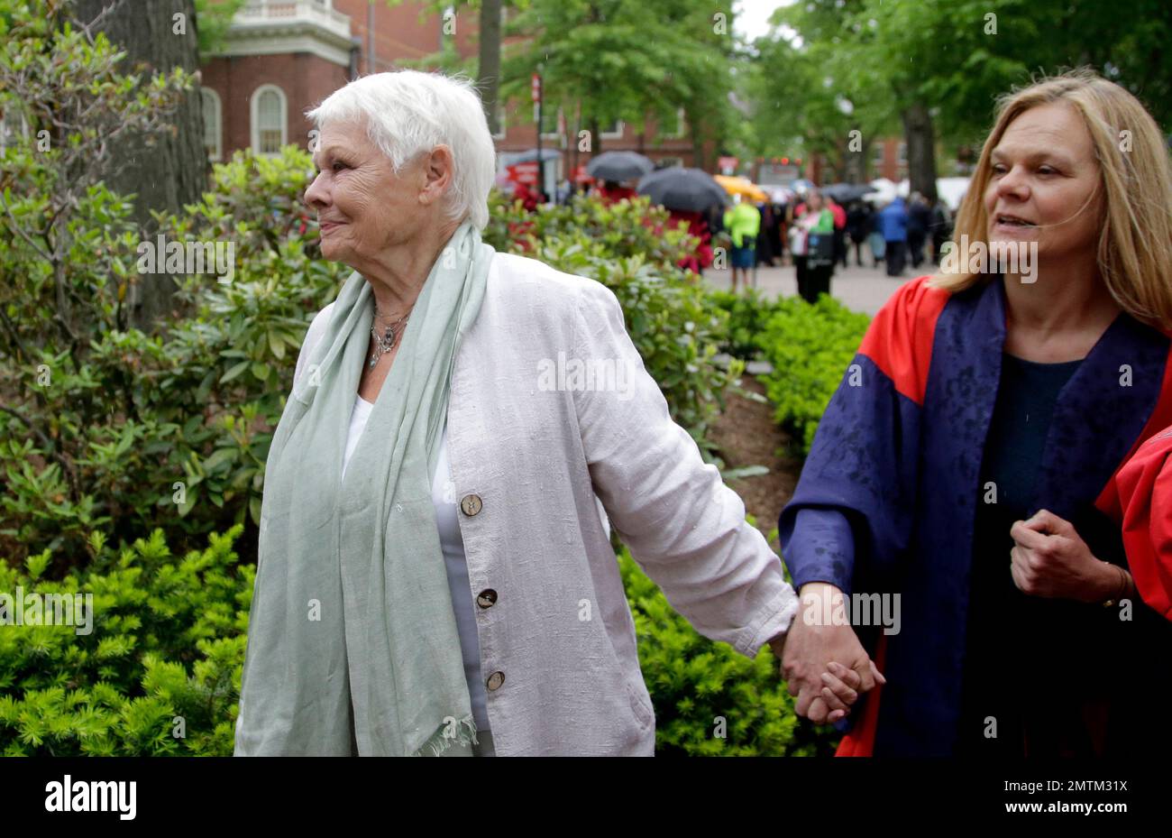 Actress Judi Dench, center, arrives at Harvard University with her ...