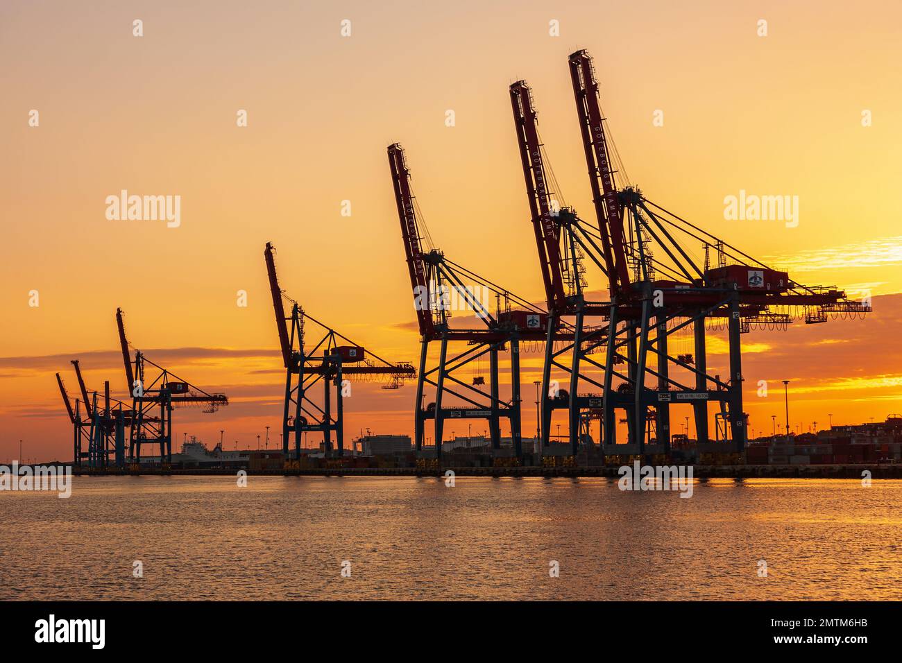 Beautiful sunset seaport container hi-res stock photography and images ...