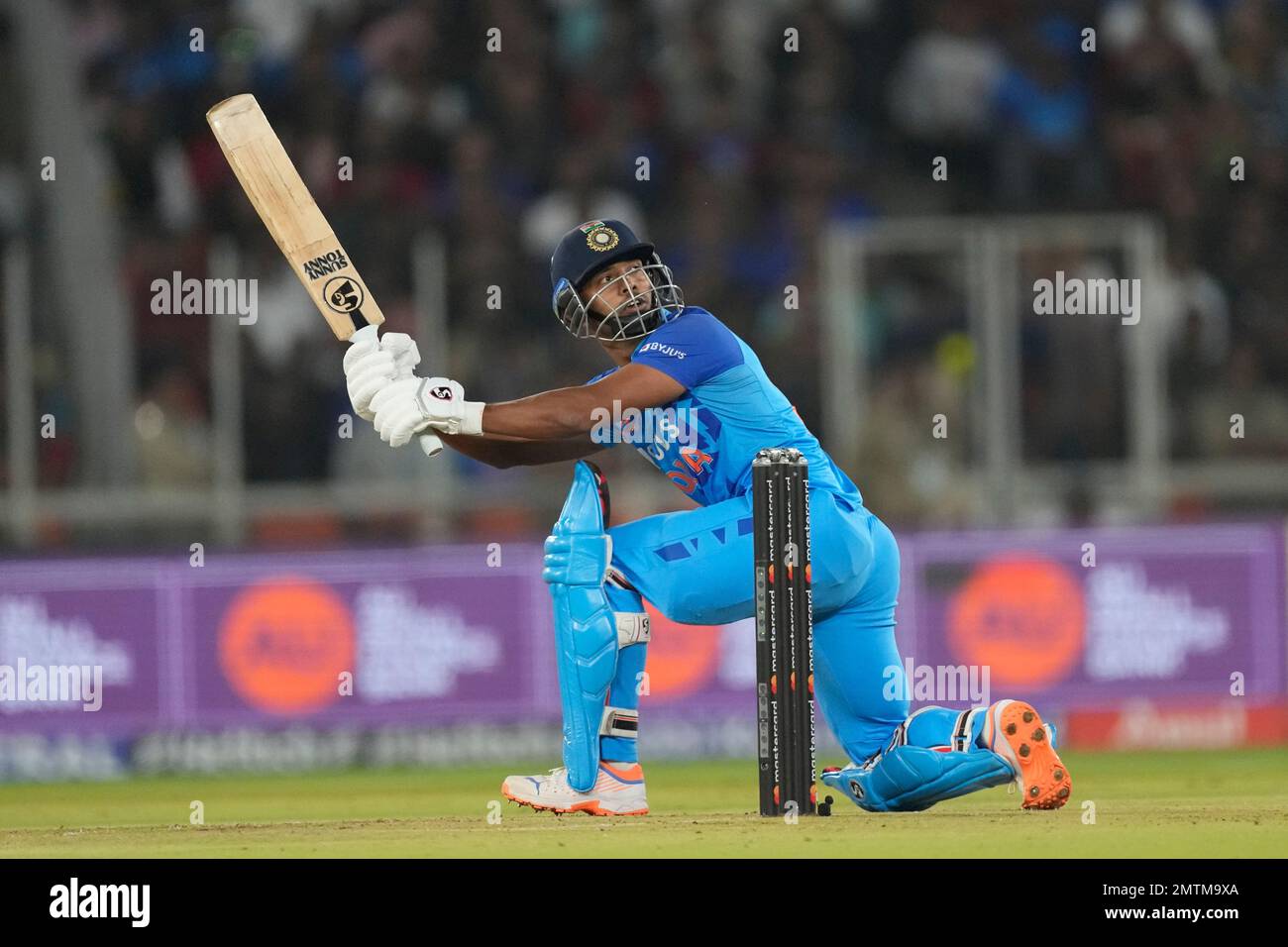 India's Rahul Tripathi plays a shot during the third T20 international ...