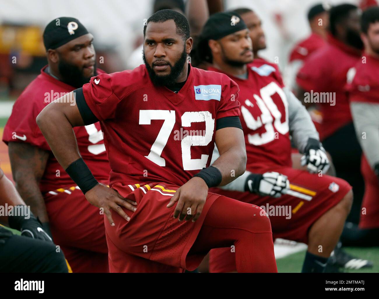 Washington Redskins defensive lineman Anthony Lanier II (72) stretches ...
