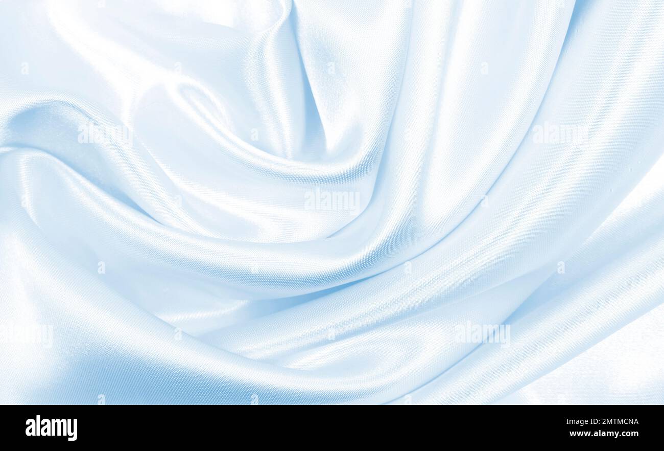 Smooth elegant blue silk or satin luxury cloth texture can use as abstract background. Luxurious ...