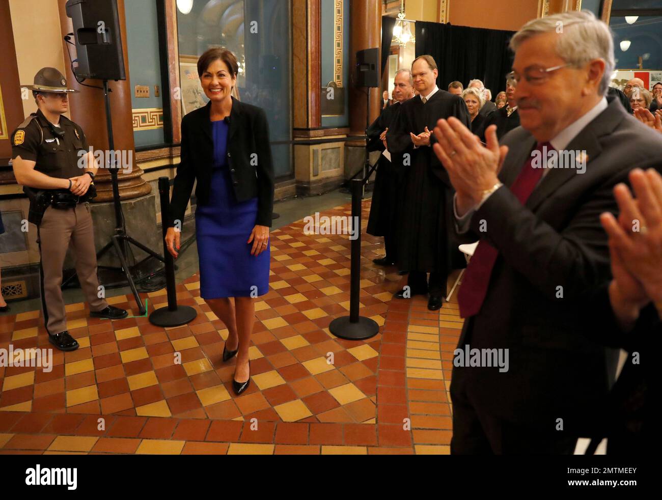 Iowa Lt. Gov. Kim Reynolds arrives before being sworn in as governor by ...