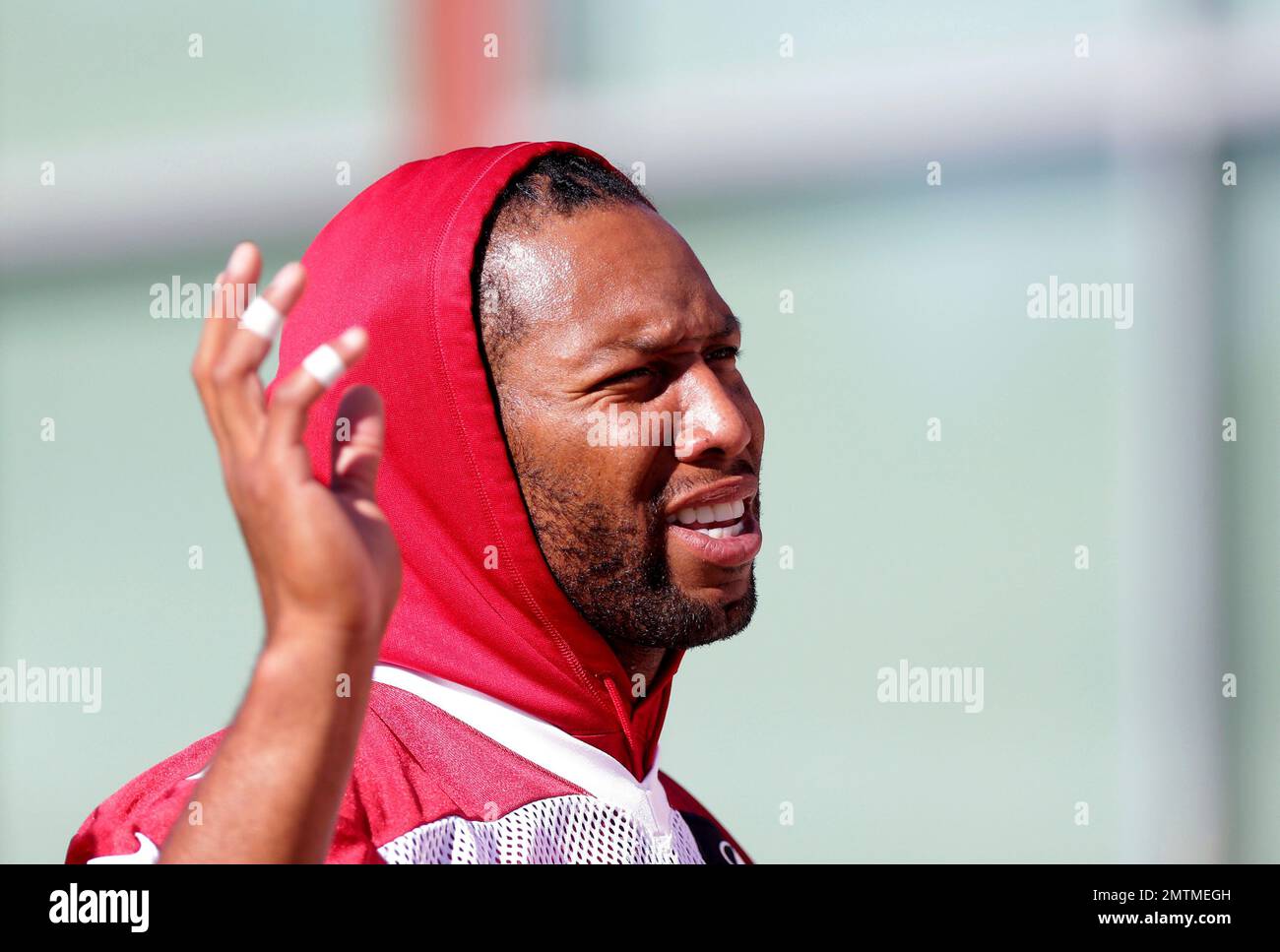Arizona Cardinals' Larry Fitzgerald watches from the sidelines during ...