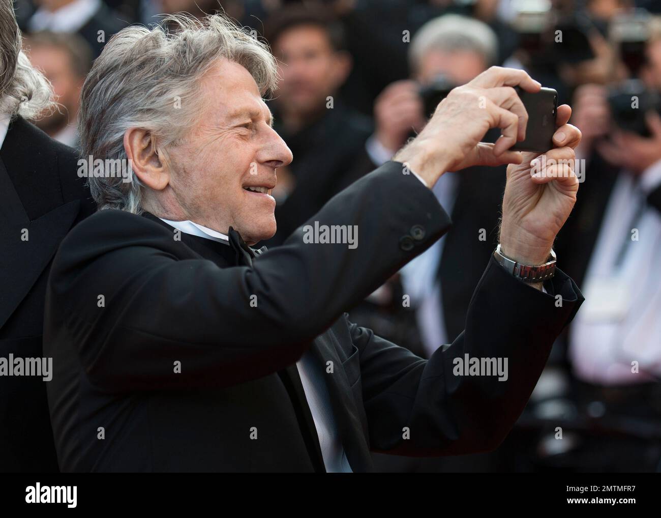 Roman Polanski poses for photographers upon arrival at the 70th ...