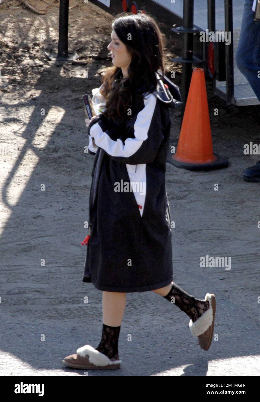 Shenae Grimes wears a white sleeveless top and black skirt paired with ...