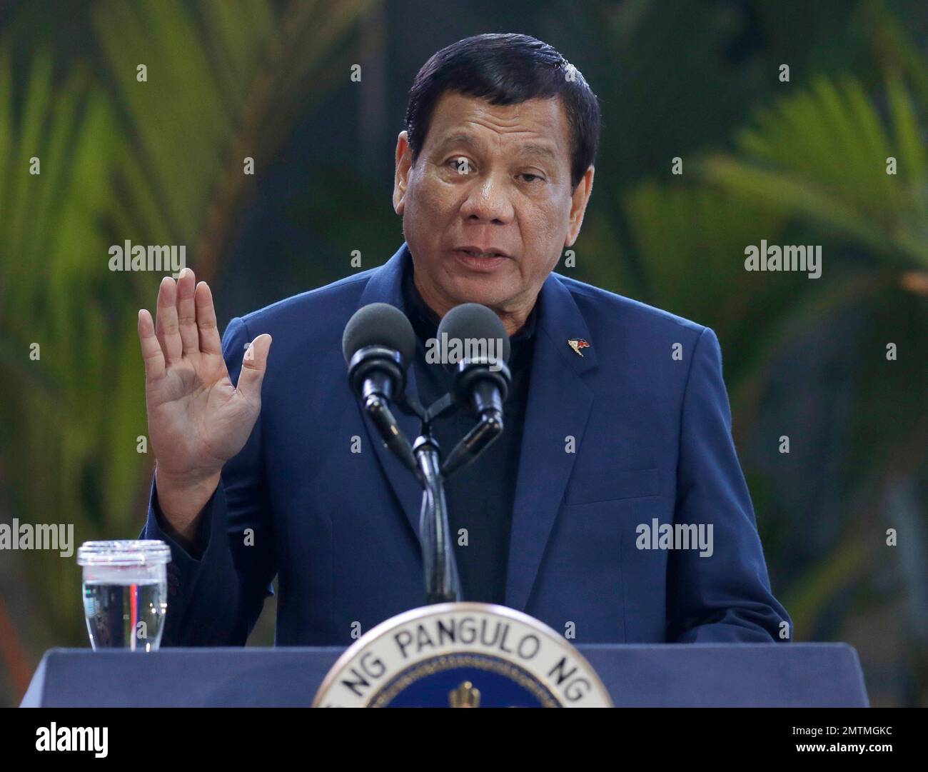 Philippine President Rodrigo Duterte gestures as he answers questions ...