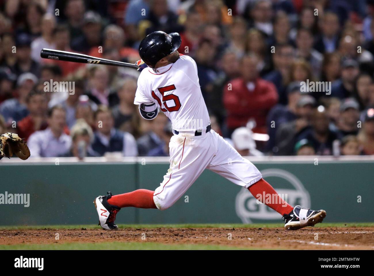 Boston Red Sox's Dustin Pedroia takes a swing during the fifth inning of a baseball game at ...