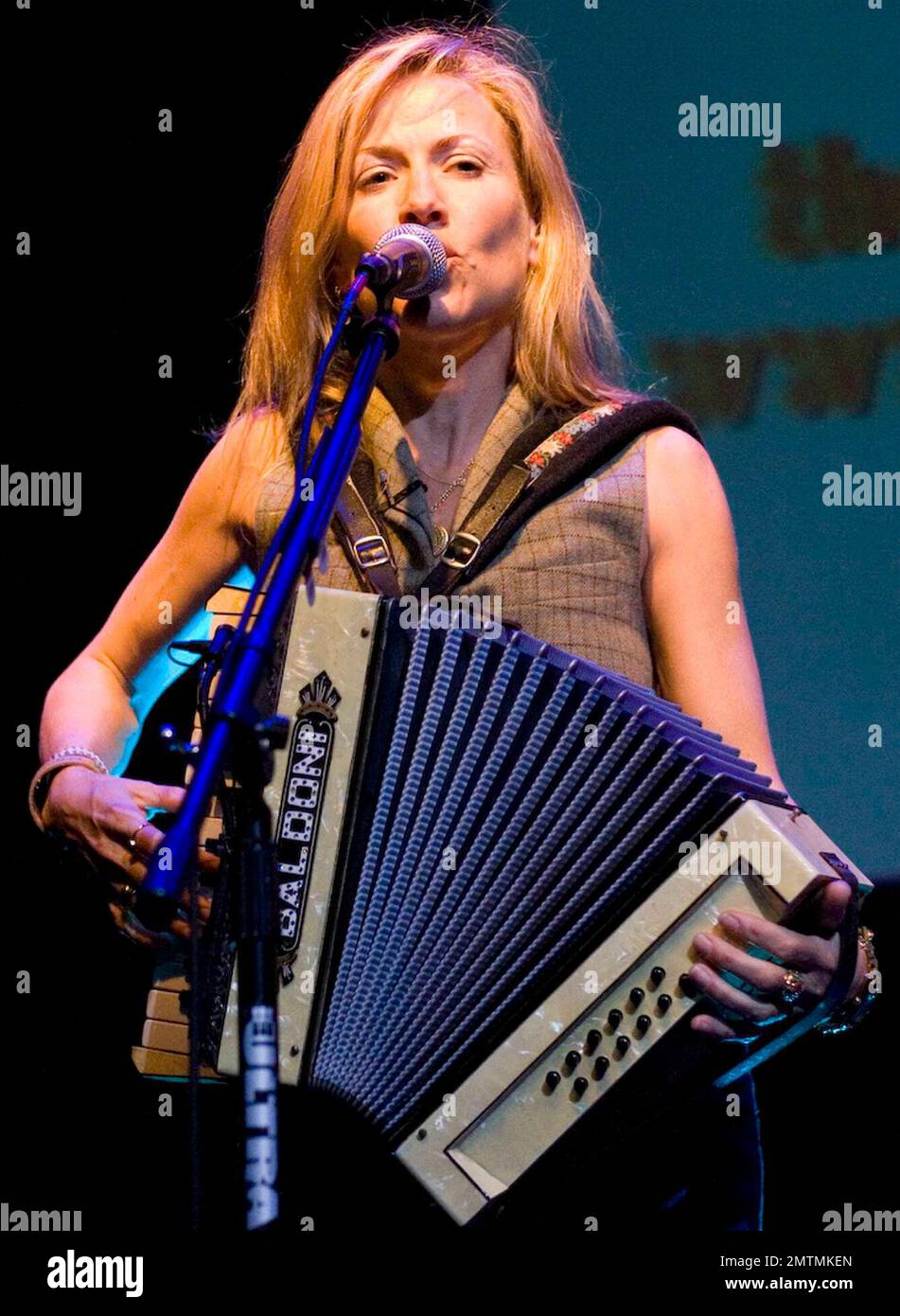 Singer Sheryl Crow performs onstage as part of the Stop Global Warming ...