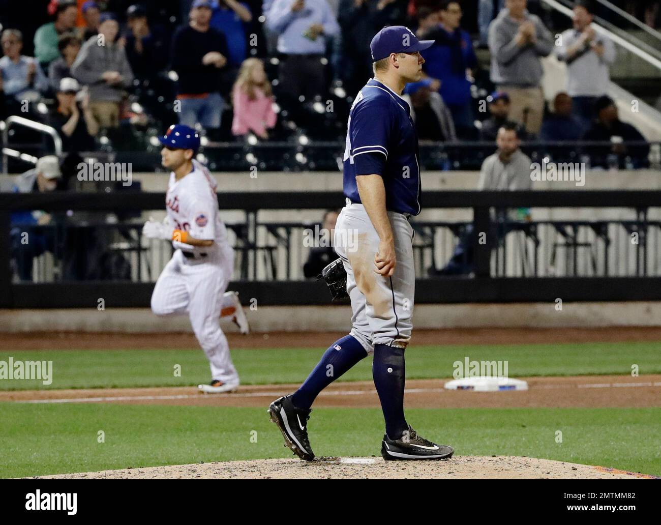 San Diego Padres relief pitcher Craig Stammen, right, reacts as New ...