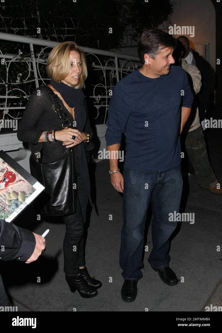 Sheryl Crowe looks a bit chilly as she stands waiting for her car ...