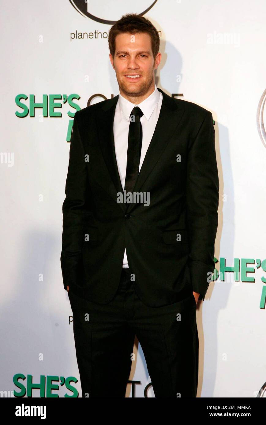 Geoffrey Stults walks the red carpet at the premiere of "She's Out of ...