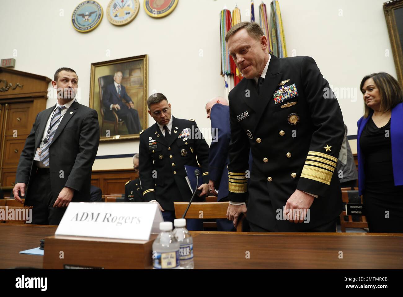 National Security Agency Director Adm. Michael S. Rogers takes his seat ...