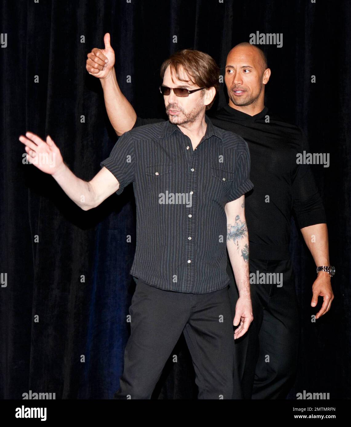 Dwayne Johnson and Billy Bob Thornton fool around on stage at the ...