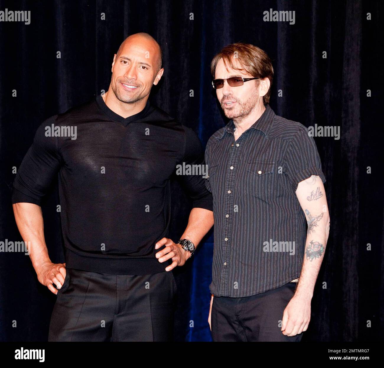 Dwayne Johnson and Billy Bob Thornton fool around on stage at the ...