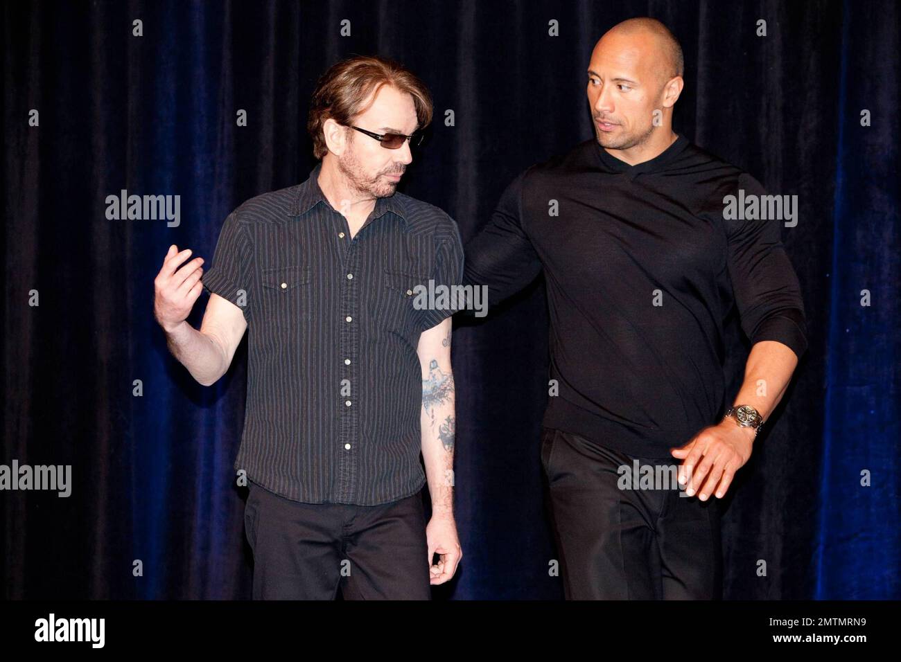 Dwayne Johnson and Billy Bob Thornton fool around on stage at the ...