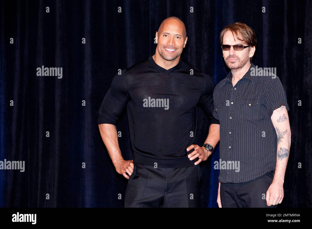 Dwayne Johnson and Billy Bob Thornton fool around on stage at the ...