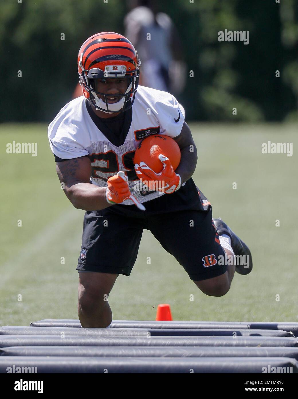 Cincinnati Bengals running back Joe Mixon runs a drill during organized ...