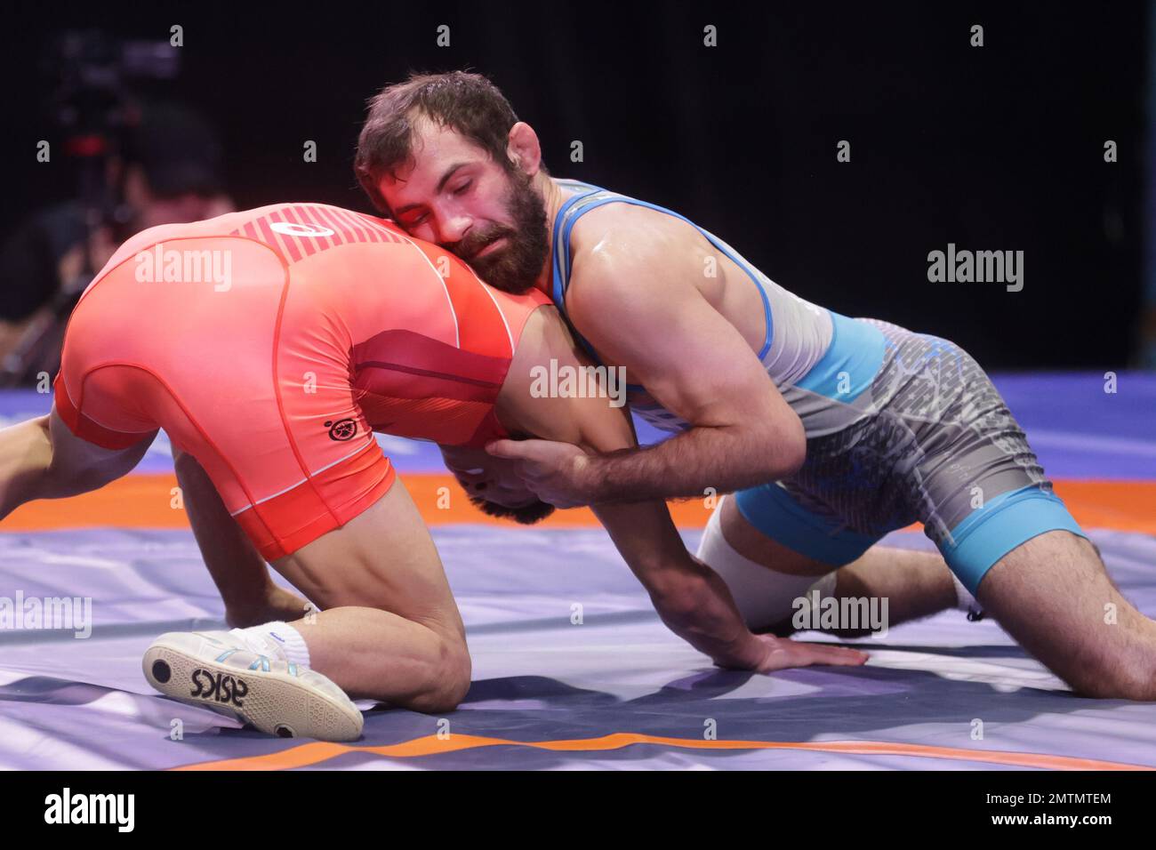 ZAGREB, CROATIA – FEBRUARY 01: Rikuto Arai of Japan (red) competes ...