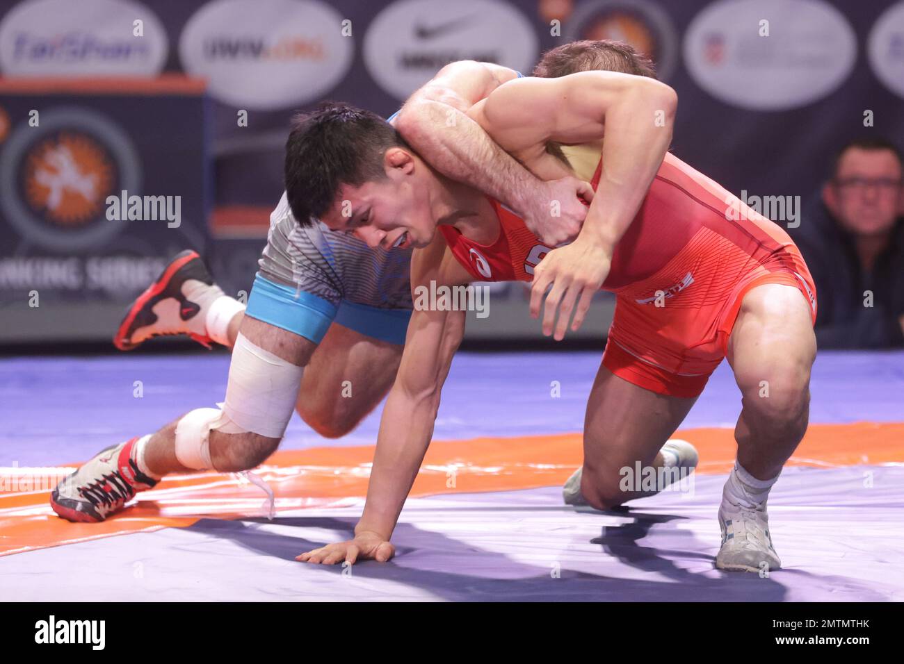 ZAGREB, CROATIA – FEBRUARY 01: Rikuto Arai of Japan (red) competes ...