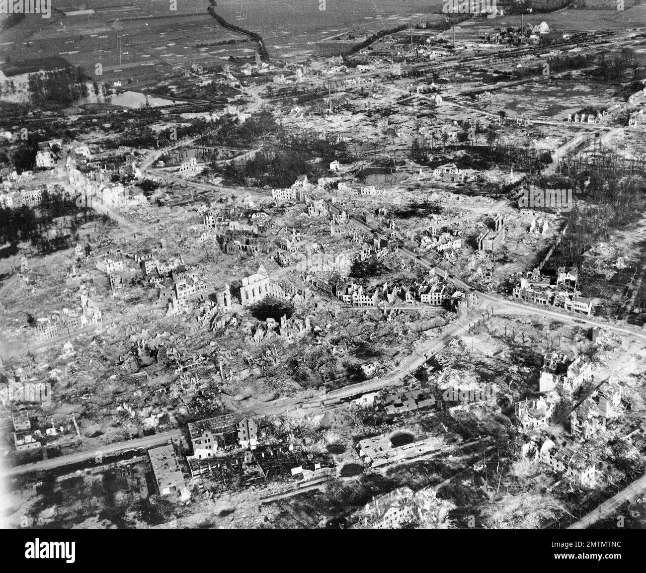 Bomb craters and devastated buildings are all that remain in Julich ...