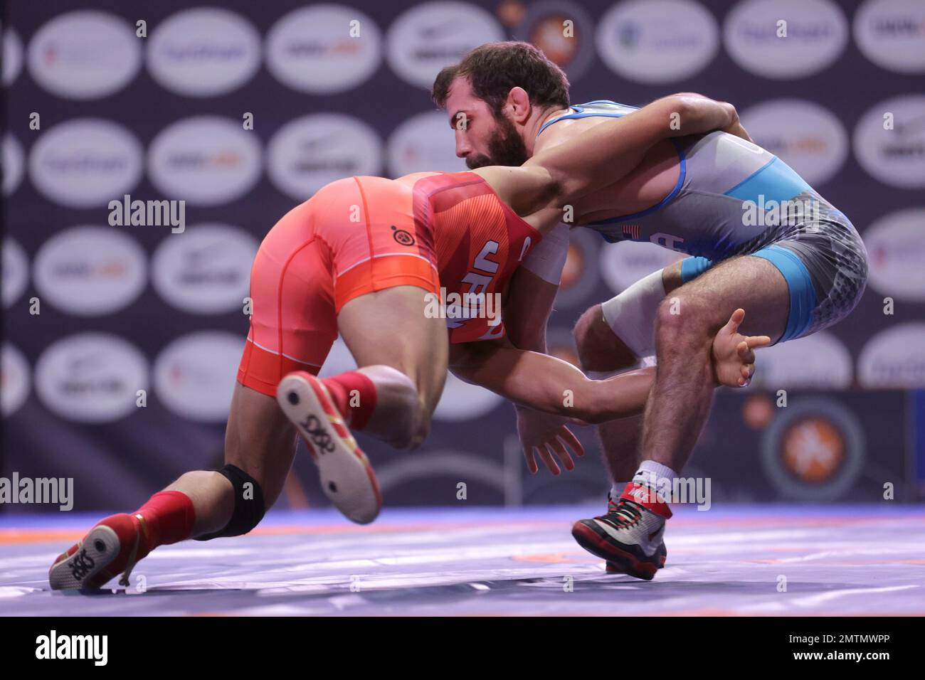 ZAGREB, CROATIA – FEBRUARY 01: Yuto Nishiuchi of Japan (red) competes ...