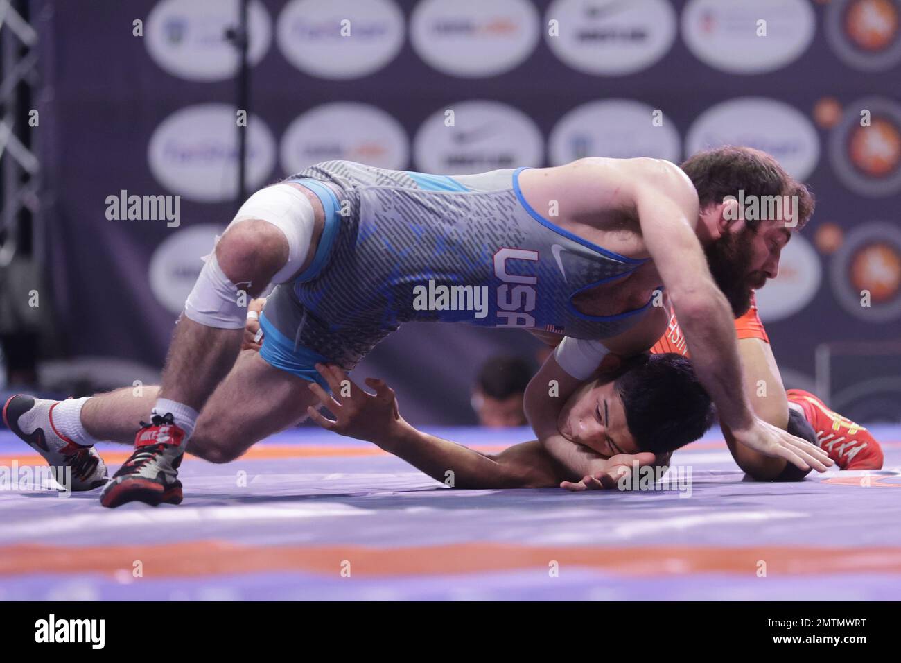 ZAGREB, CROATIA – FEBRUARY 01: Yuto Nishiuchi of Japan (red) competes ...