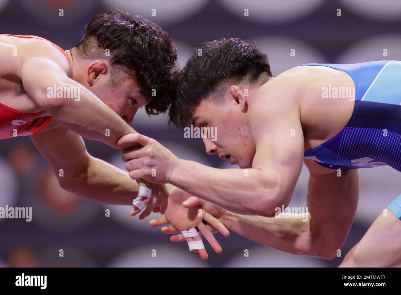 ZAGREB, CROATIA – FEBRUARY 01: Kaiji Ogino of Japan (red) competes ...