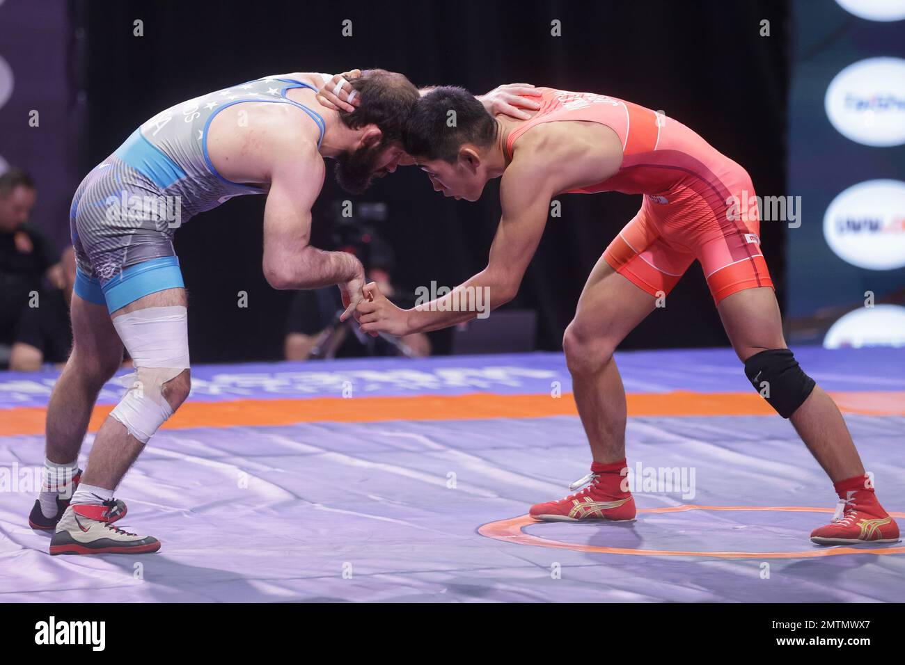ZAGREB, CROATIA – FEBRUARY 01: Yuto Nishiuchi of Japan (red) competes ...