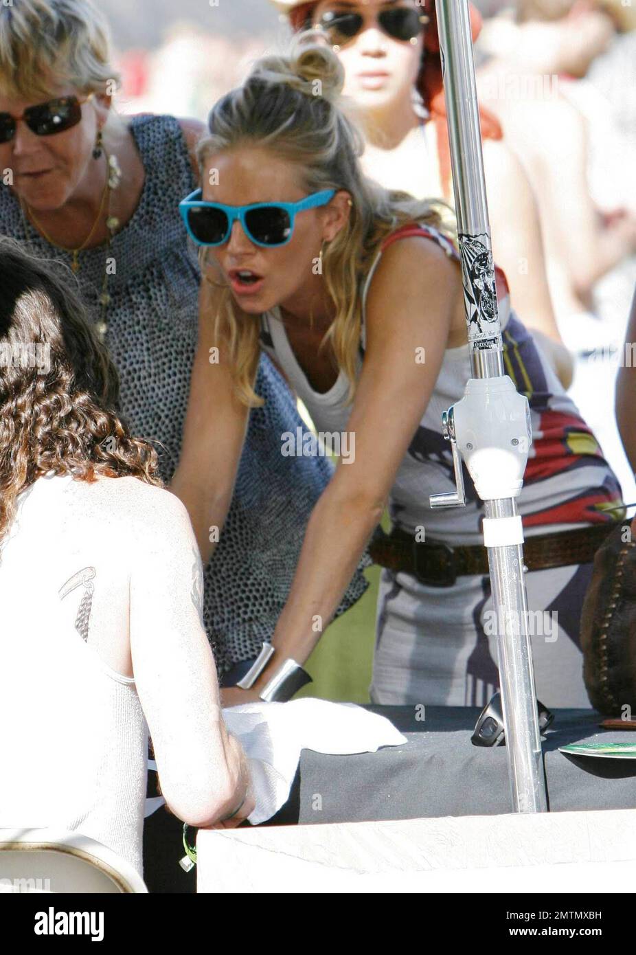Exclusive!! Sienna Miller in her cool blue shades, has trouble obtaning ...