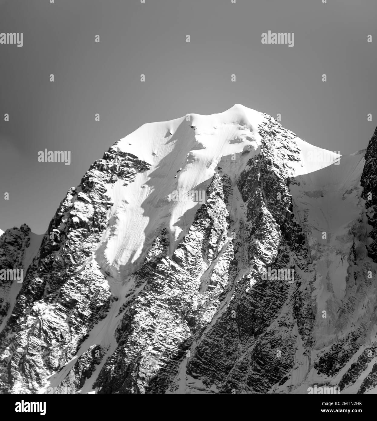 Panorama of the tongue of an alpine glacier with snow descends from ...