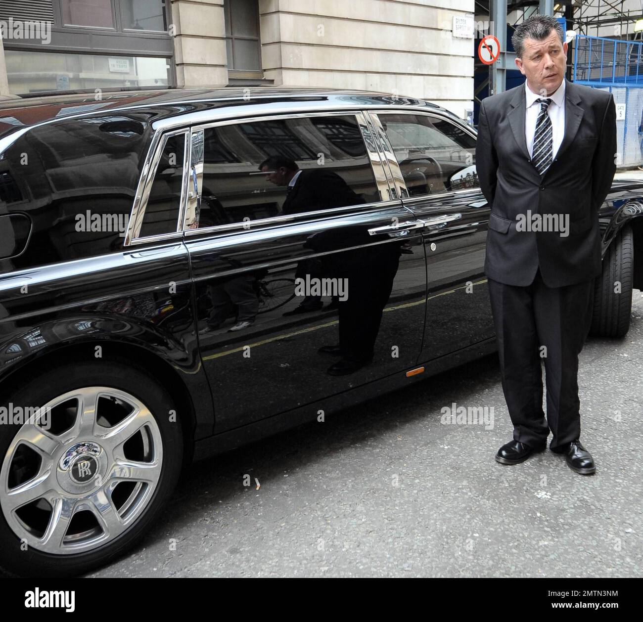 Former "American Idol" judge Simon Cowell arrives in a chauffeur-driven ...